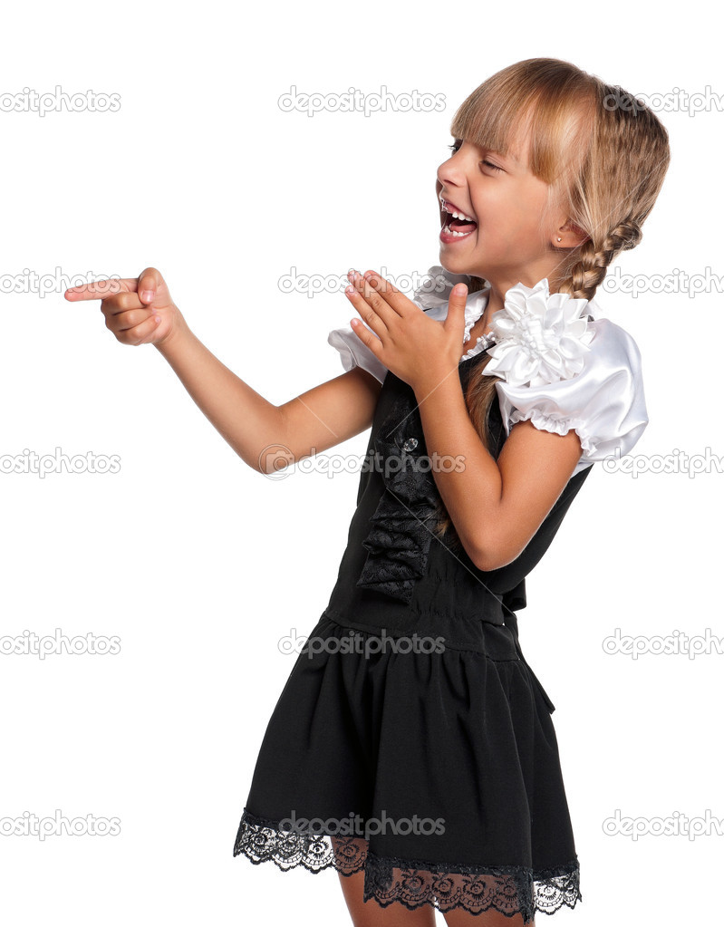 Little girl in school uniform — Stock Photo © VaLiza #12799875