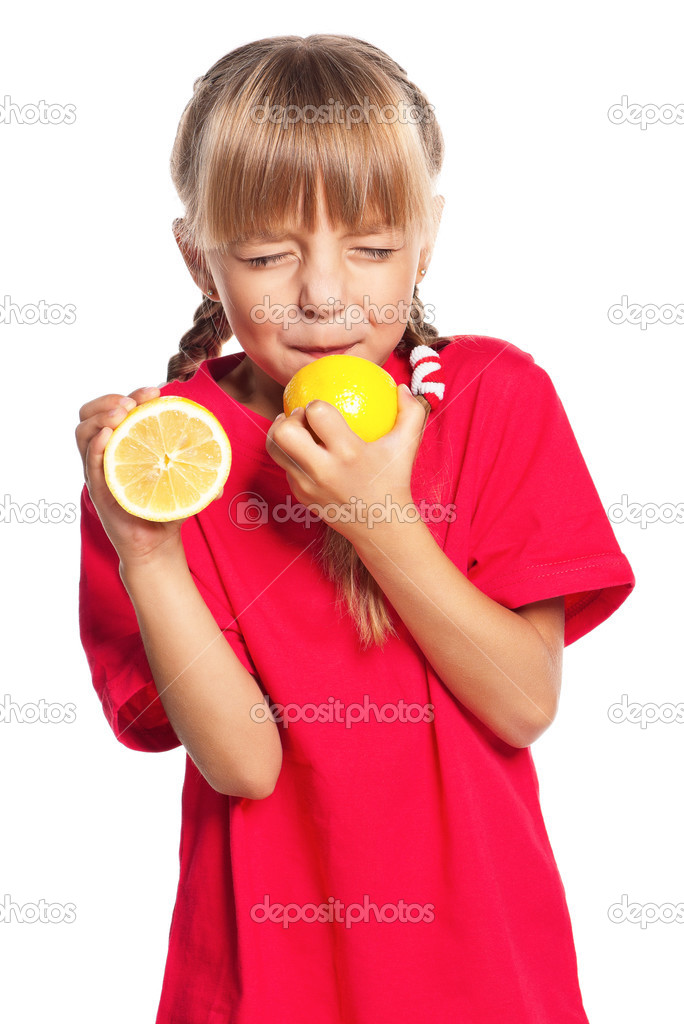 Little girl with lemon Stock Photo by ©VaLiza 38972015
