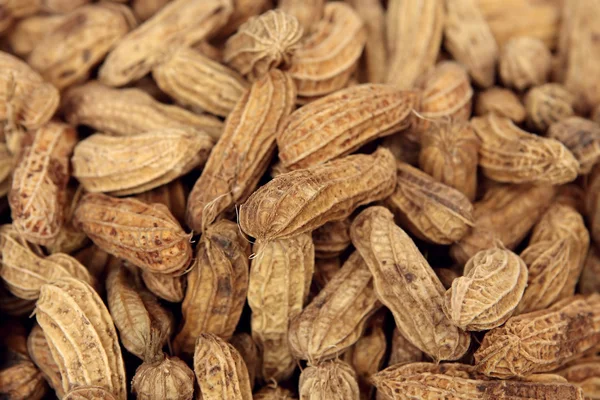 sprinkle nuts peanuts on market - Stock Image - Everypixel