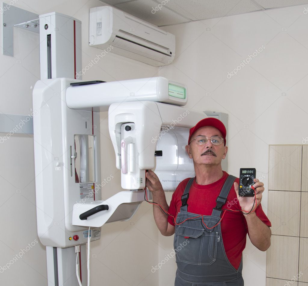 The technician repairs Digital Panoramic X-ray Sistem — Stock Photo ...