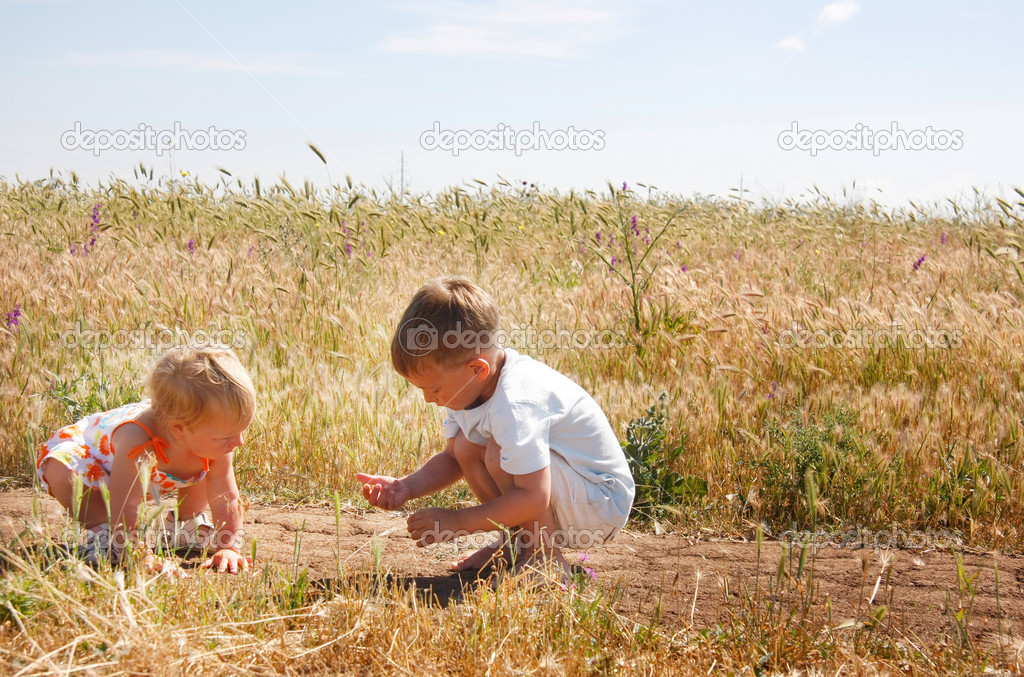 Two kids playing on country road Stock Photo by ©volare2004 12616371