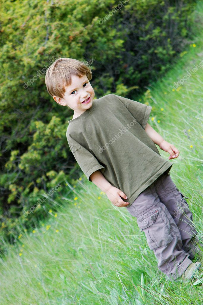 Cute boy on natural background Stock Photo by ©volare2004 12619491