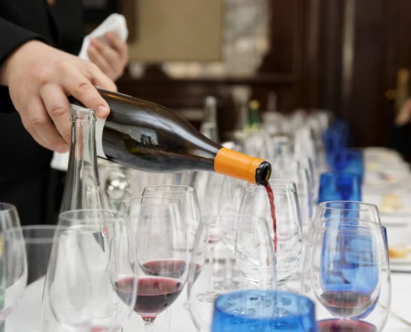 Pouring wine - winetasting event Stock Photo by ©Serreitor 12474530