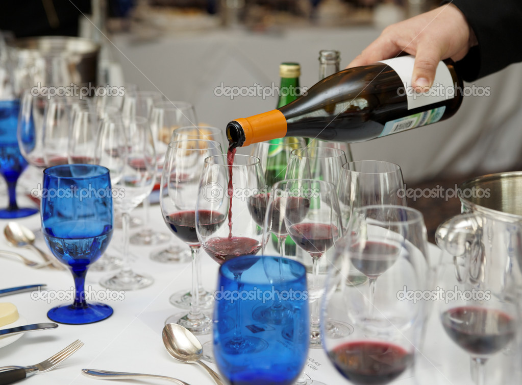 Pouring wine - winetasting event Stock Photo by ©Serreitor 12474530