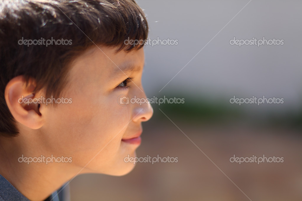 Profile of young boy Stock Photo by ©dmediapro 23516323