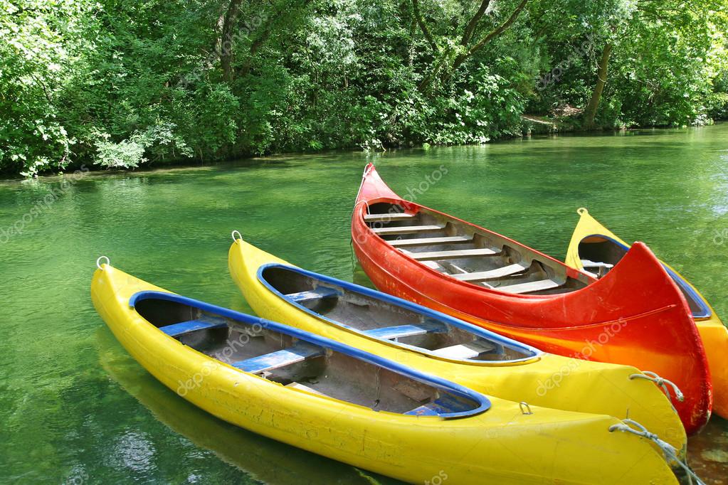 Four plastic canoes Stock Photo by ©smuki 15417697