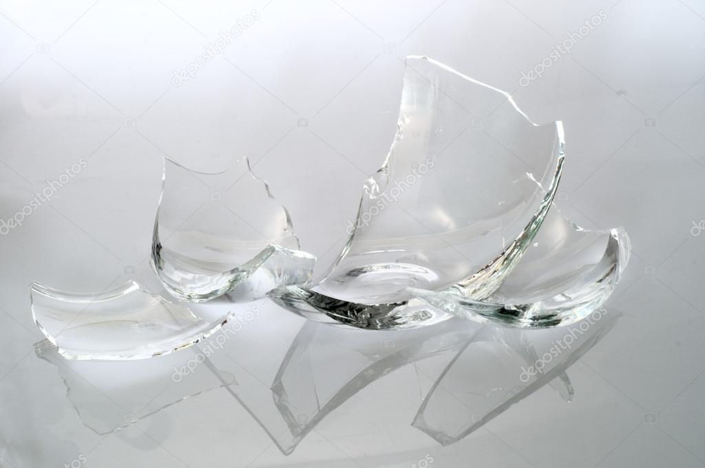 BROKEN GLASS PIECES Stock Photo by ©Voyagerix 19399835