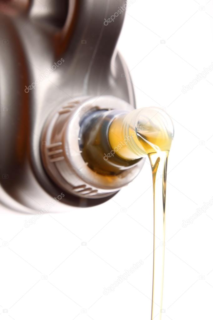Can with car engine oil pouring isolated — Stock Photo © Voyagerix ...