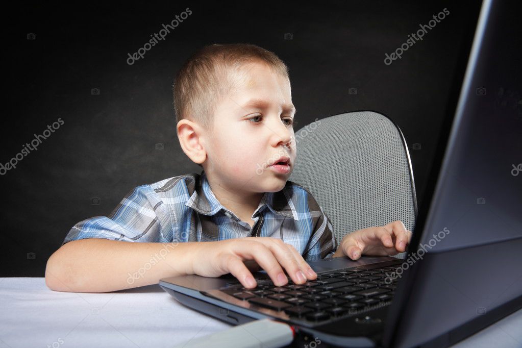 Computer addiction child with laptop notebook Stock Photo by ©Voyagerix ...