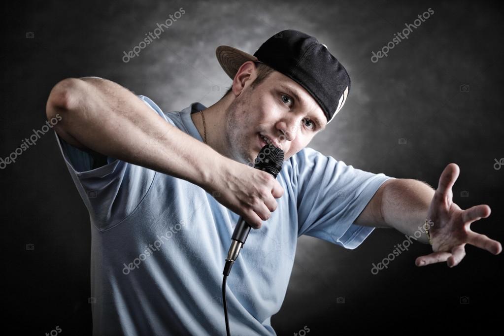 Rap singer man with microphone cool hand gesture Stock Photo by ...