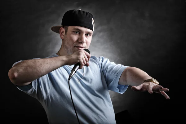 Rap singer man with microphone cool hand gesture Stock Photo by ...