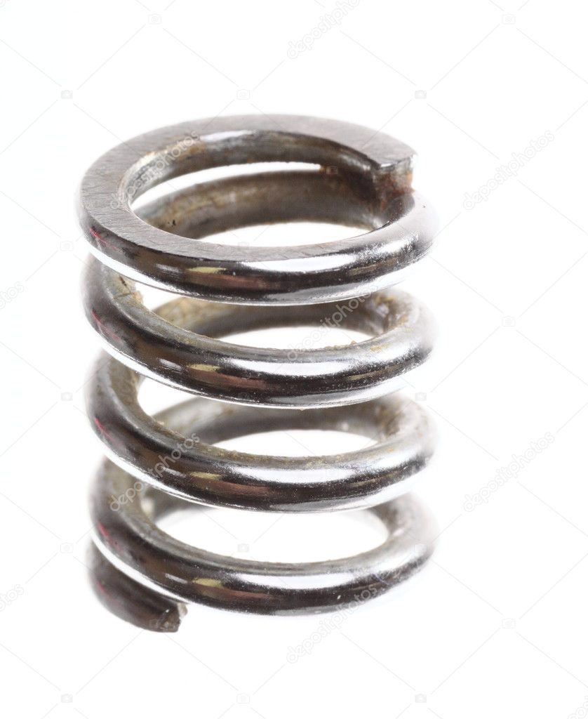 Metal industrial spring isolated on white — Stock Photo © Voyagerix ...
