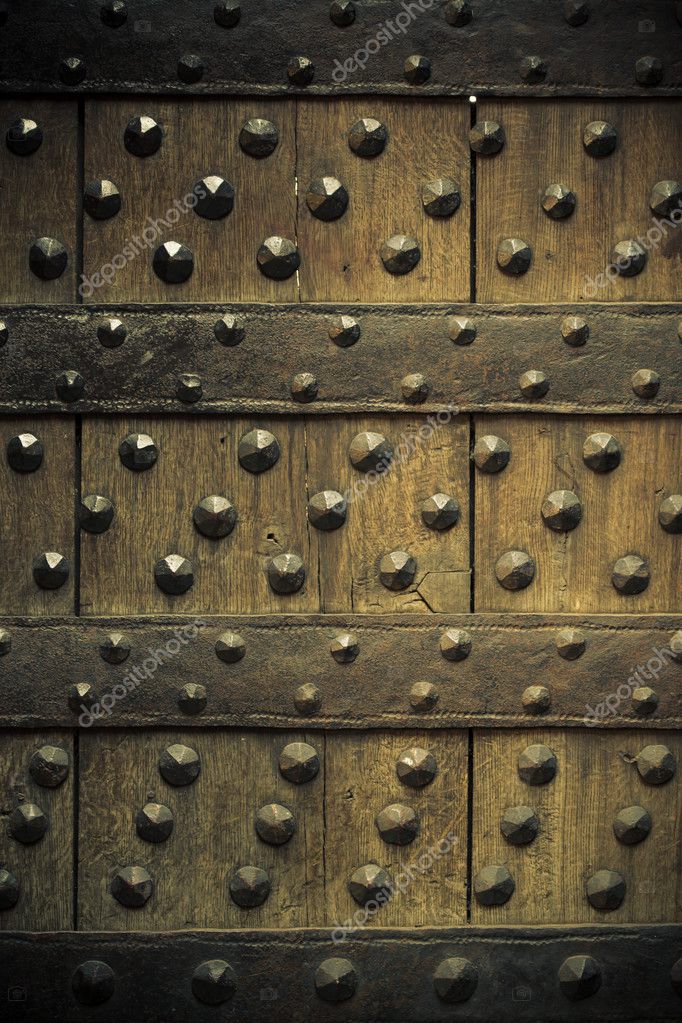 Antiguo fondo de madera con remaches metálicos 2024