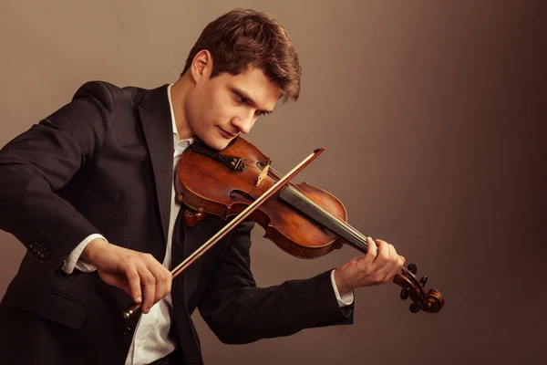 Man violinist playing violin. Classical music art - Stock Image ...