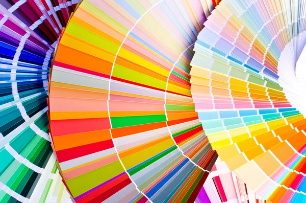 Samples with different shades of blue and can of blue paint with paint ...