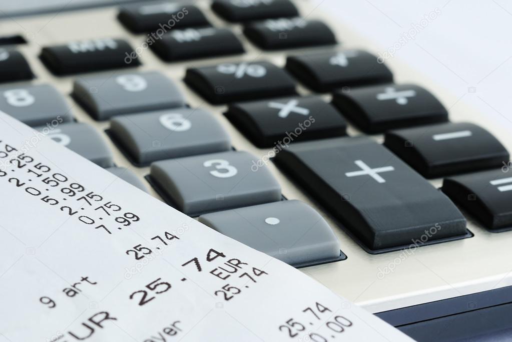 Printed receipt from shop on calculator closeup image — Stock Photo ...