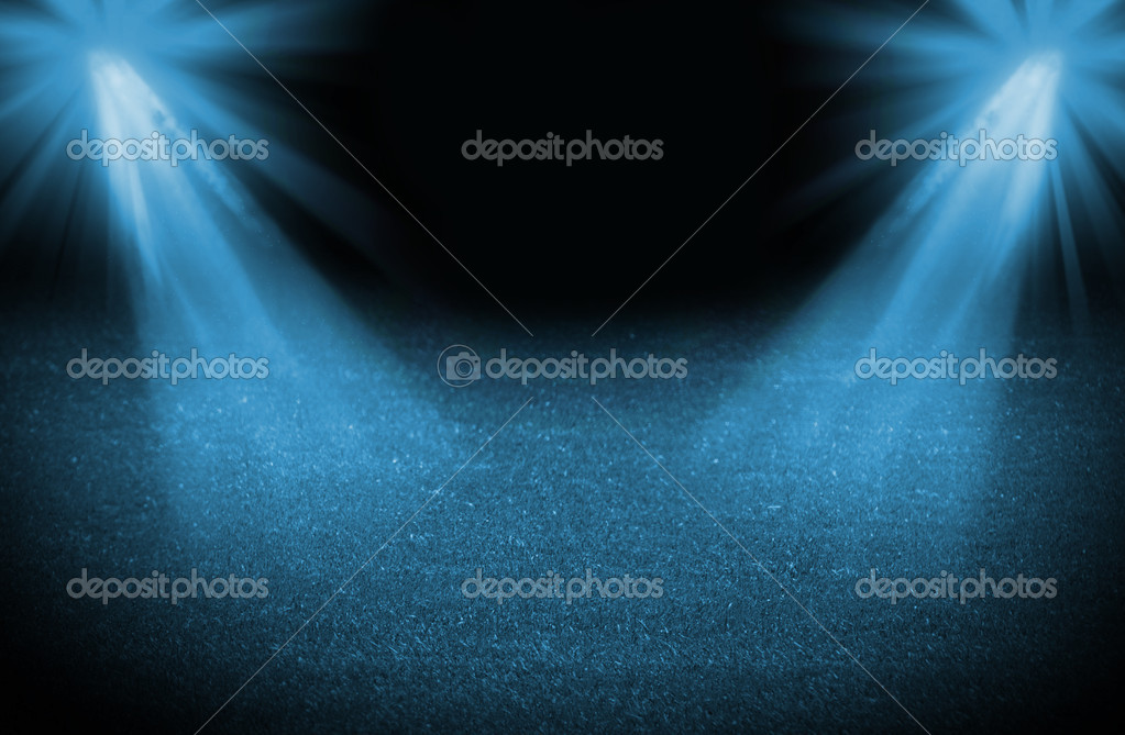 Blue cold light soccer field, bright spotlights, illuminated stadium ...