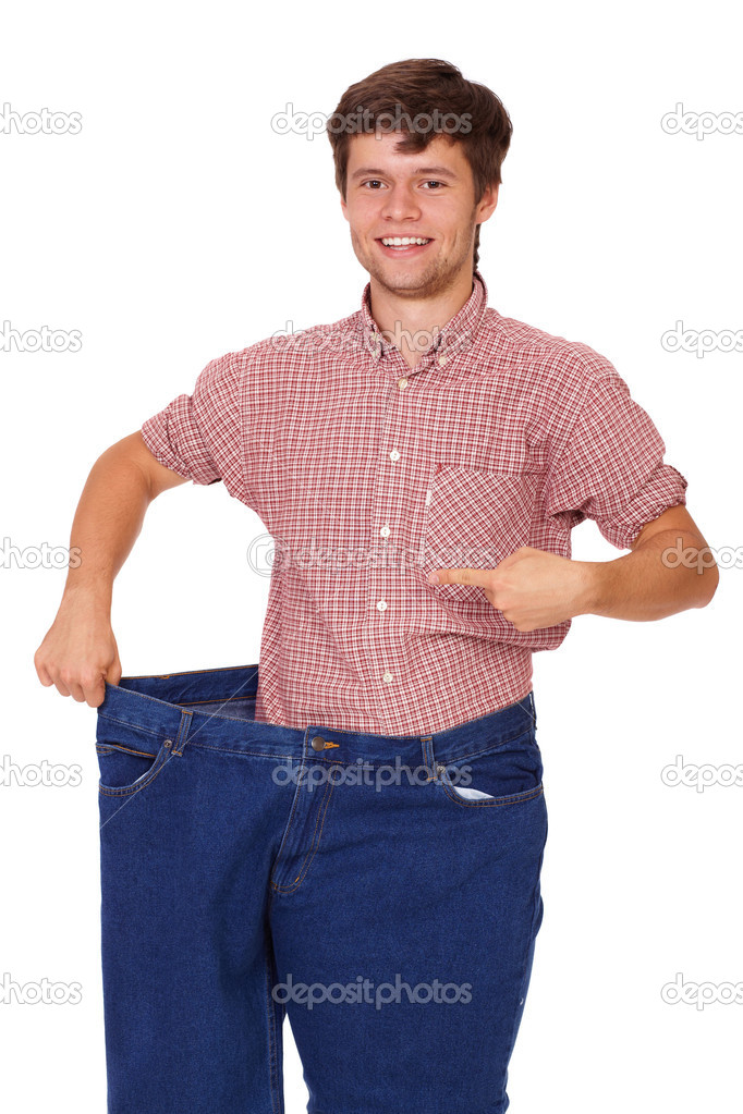 Young slim happy handsome guy in jeans, isolated on white — Stock Photo ...