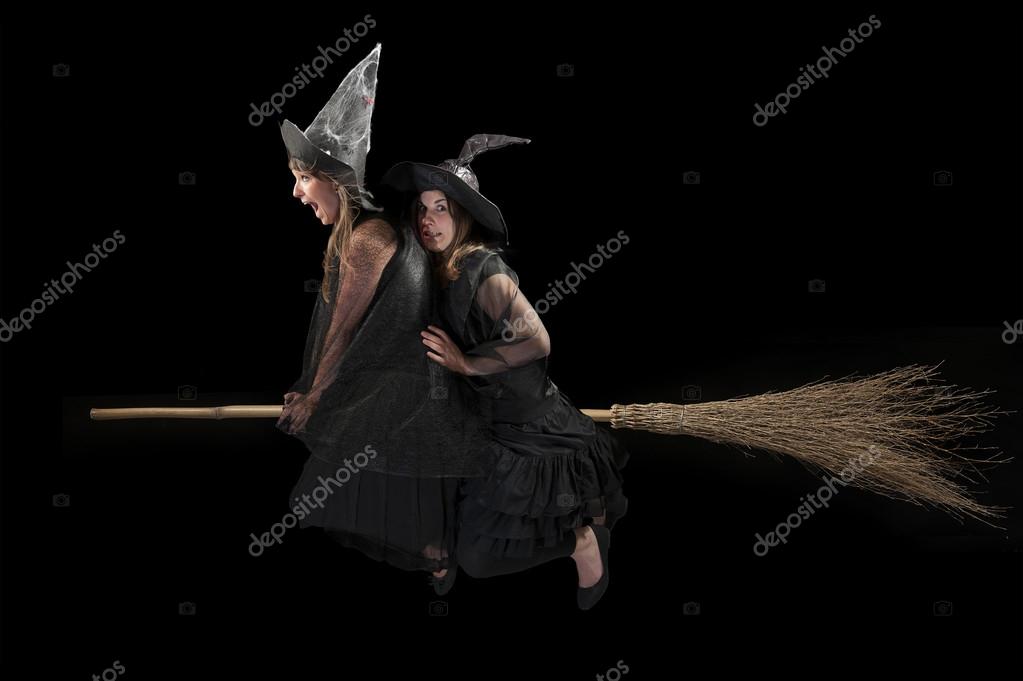 Fotos: brujas en escoba | dos brujas miedas volar en una escoba — Foto de stock © aldegonde ...
