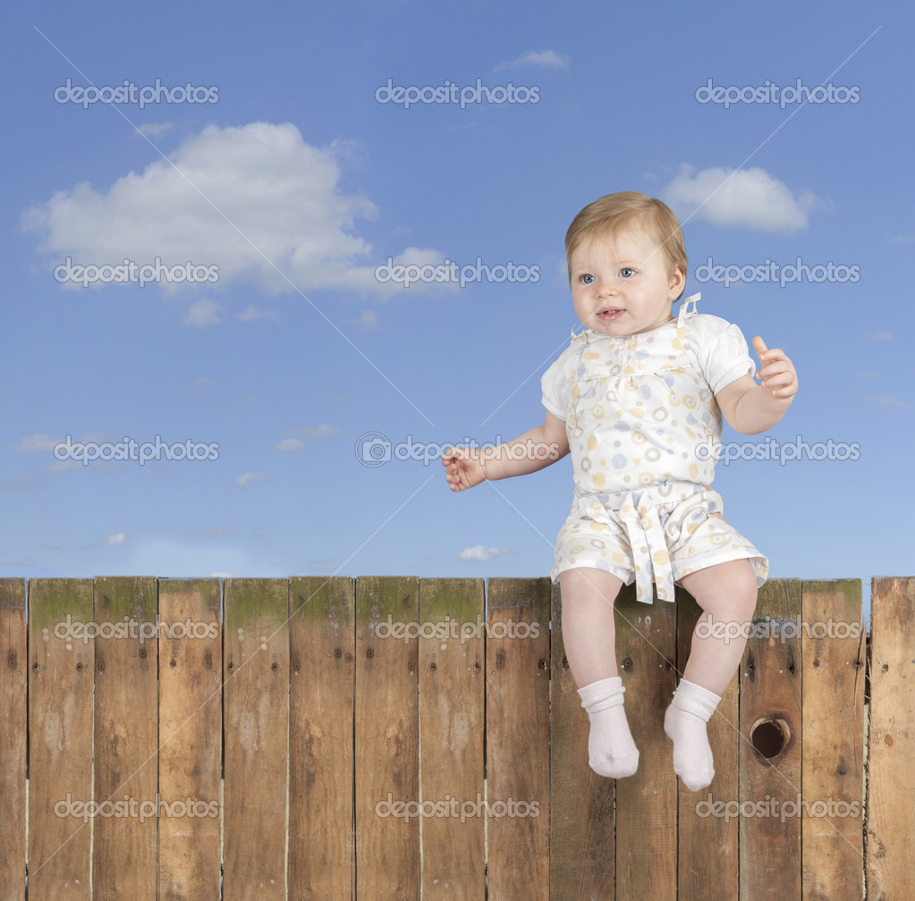 Little baby girl sitting on a fence Stock Photo by ©aldegonde 12580367 Little baby girl sitting on a fence Stock Photo by ©aldegonde 12580367
