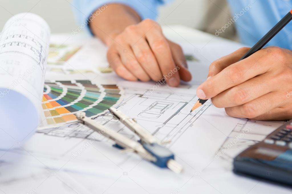 Draftsman Drawing Blueprints Stock Photo by ©ridofranz 34474381