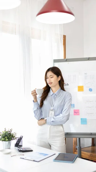 Office worker with a beautiful Asian woman in a private office, Daily ...