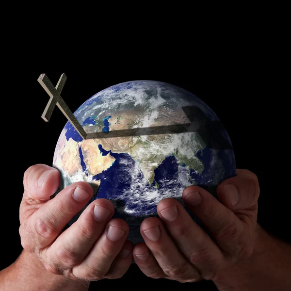Holding world in hands — Stock Photo © sdenness #12743079