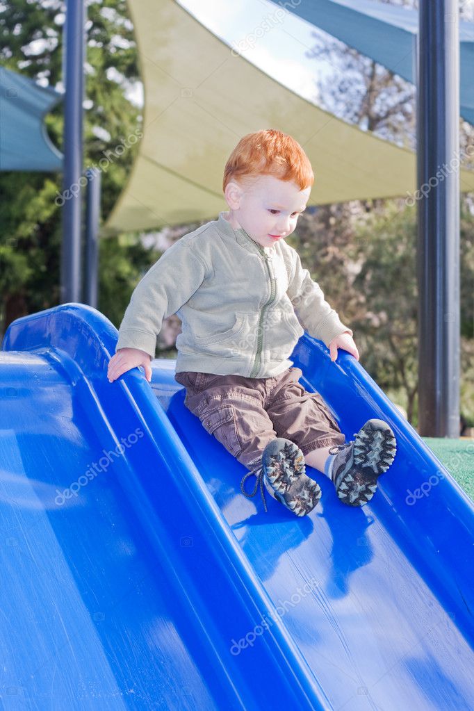 Boy on slide Stock Photo by ©sdenness 12742616