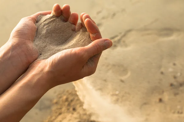 Sand through hands Stock Photos, Royalty Free Sand through hands Images ...