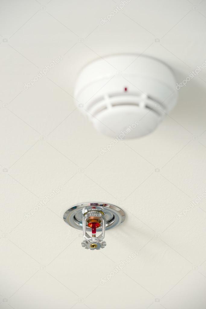 Sprinkler and smoke detector — Stock Photo © antpkr #50249117