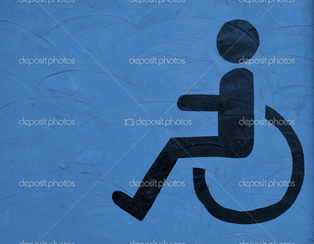The symbol handicapped on blue wall background — Stock Photo © keath369 ...