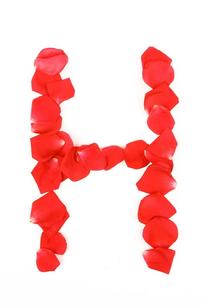 Beautiful made from red Rose petals Letter isolated on a white b Stock ...