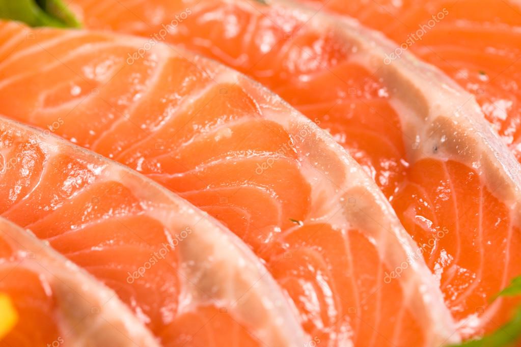 Cooked salmon fillets with lemon Stock Photo by ©gornist 13338175