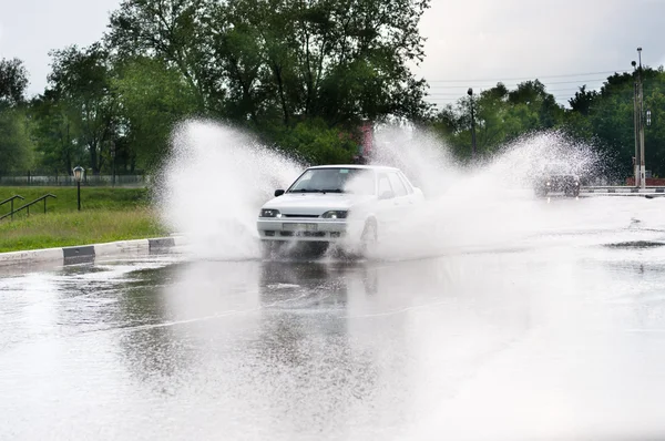 Spray from the car Stock Photo by ©db-rus 12696316
