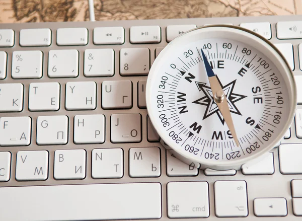 Computer keyboard and retro compass — Stock Photo © merznatalia #15793201