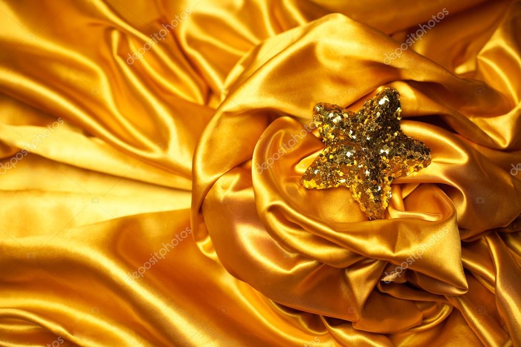 Golden glamour theme with sparkling christmas star on wavy golde ⬇ ...