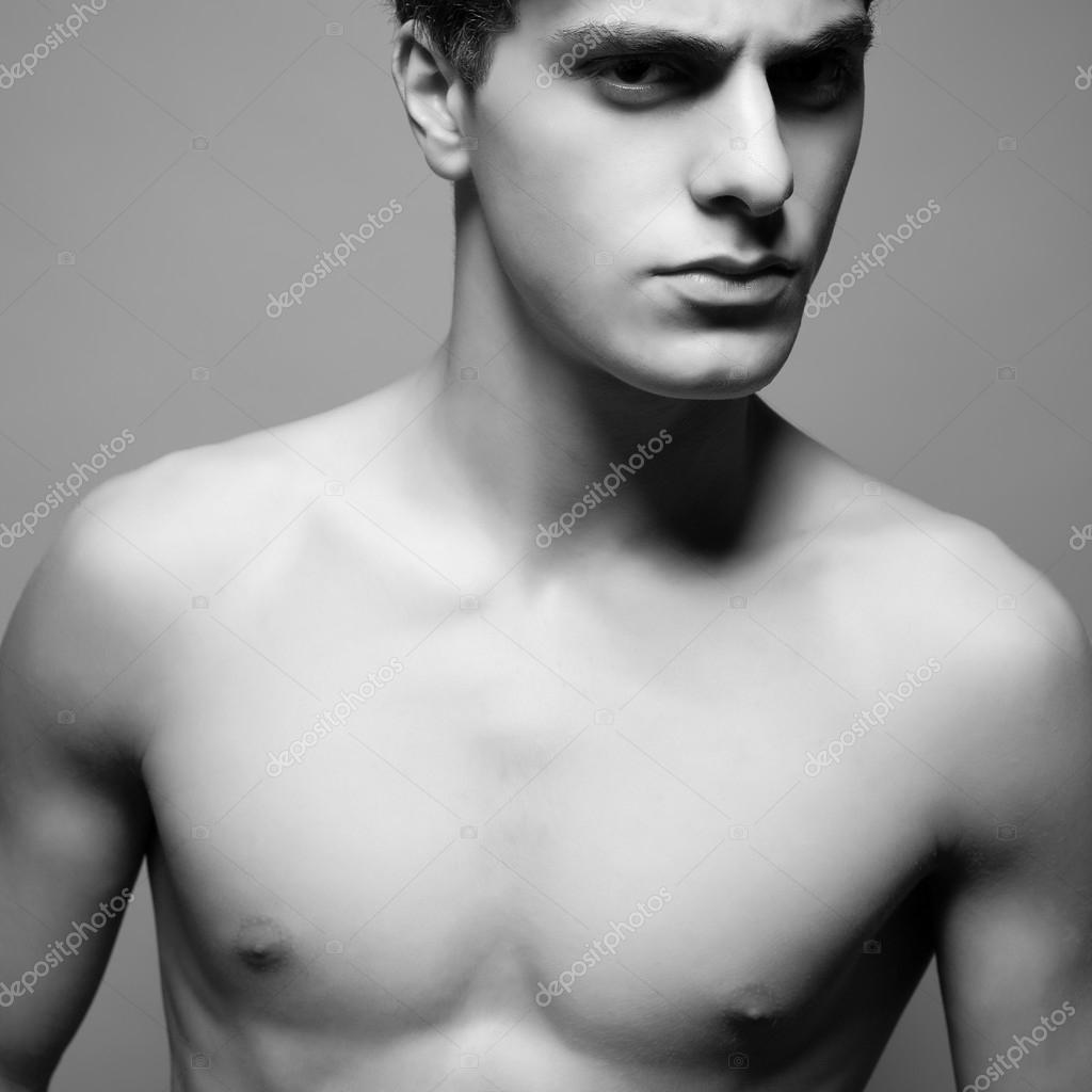 Beautiful (handsome) muscular male model with nice body posing o ...
