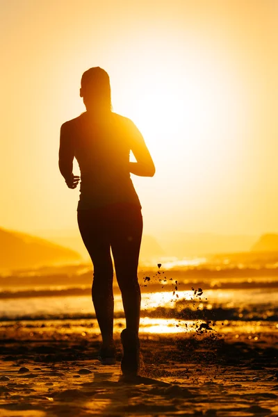 Woman running and sun - Stock Image - Everypixel