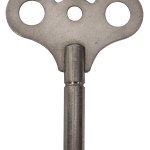 Old clock key winder isolated on white background, texture Stock Photo ...