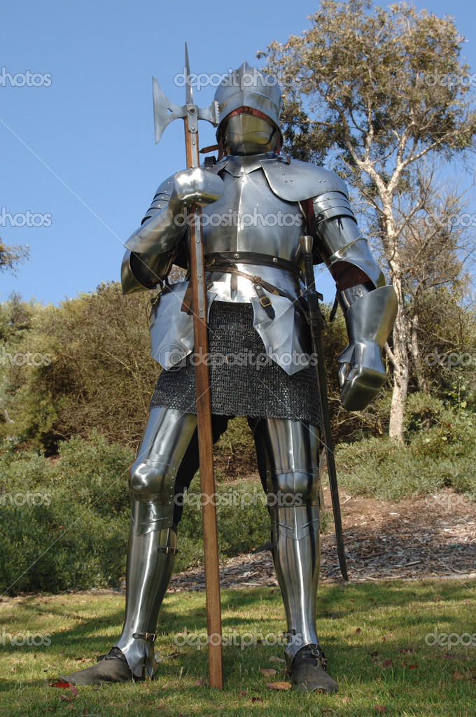 Knight standing with battle axe Stock Photo by ©jamesgroup 13470695