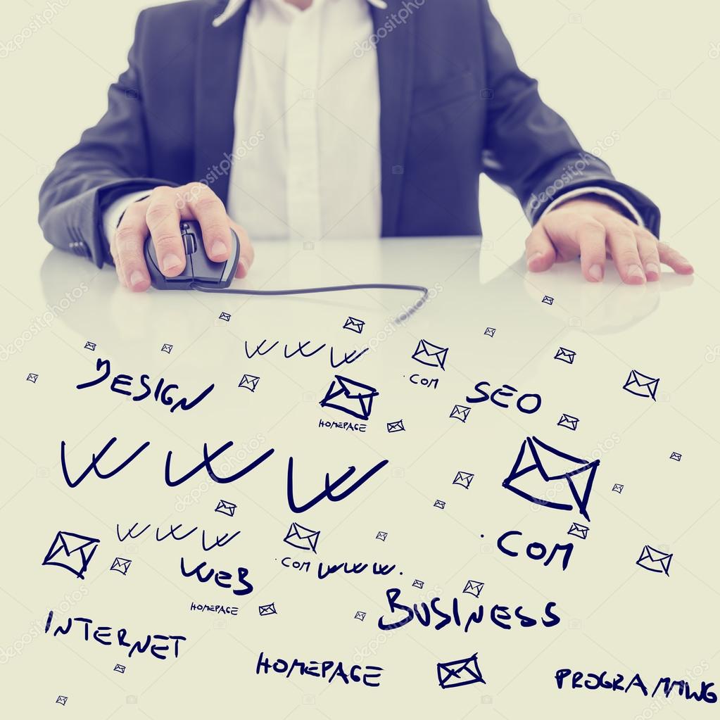 Businessman using a computer mouse Stock Photo by ©Gajus-Images 43646669