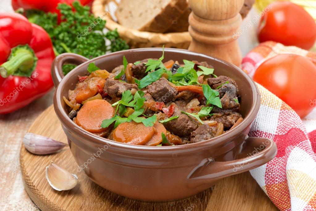 Stew with beef, prunes, vegetables and parsley Stock Photo by ©cook ...