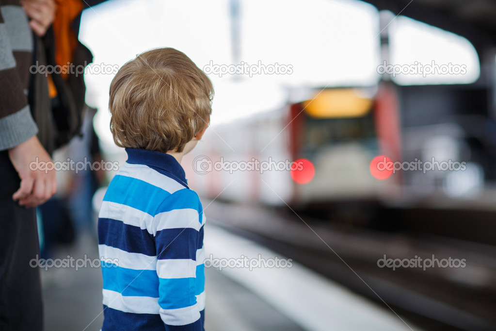 Happy little boy in a subway station. — Stock Photo © romrodinka #49048693
