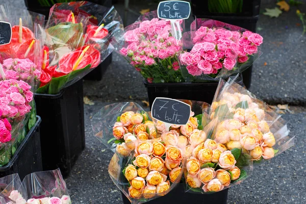 Bouquet of roses sold in the market in Provence, France. - Stock Image ...