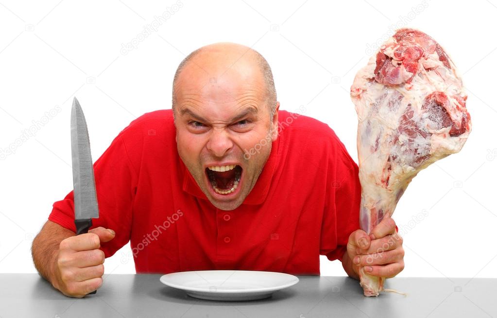 Angry hungry man (boss) with knife and raw bloody meat. Downsizing ...