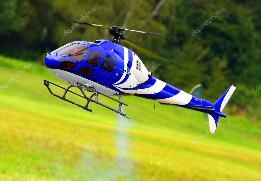 Flying helicopter (radio controlled scale-model 1:24 scale) Stock Photo ...