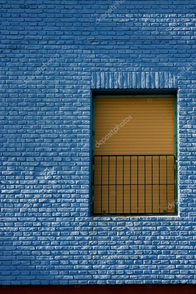Old yellow window in light blue wall Stock Photo by ©lkpro 20384031