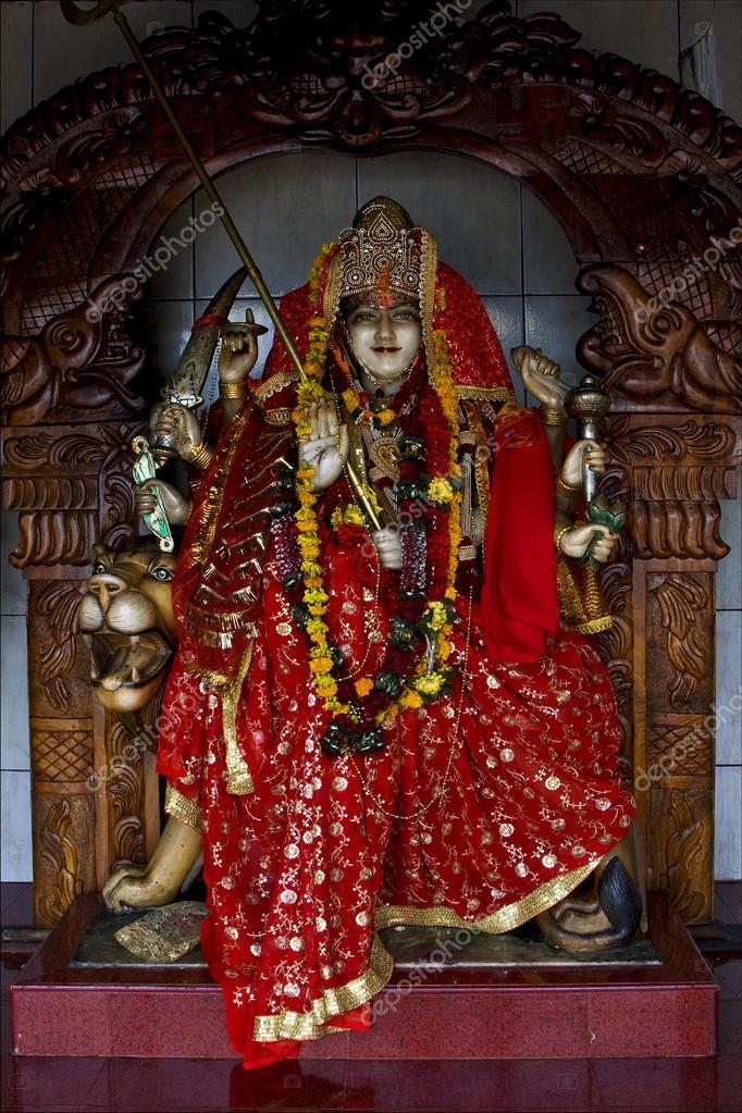 Precious stone wood statue of a Hinduism women — Stock Photo © lkpro ...
