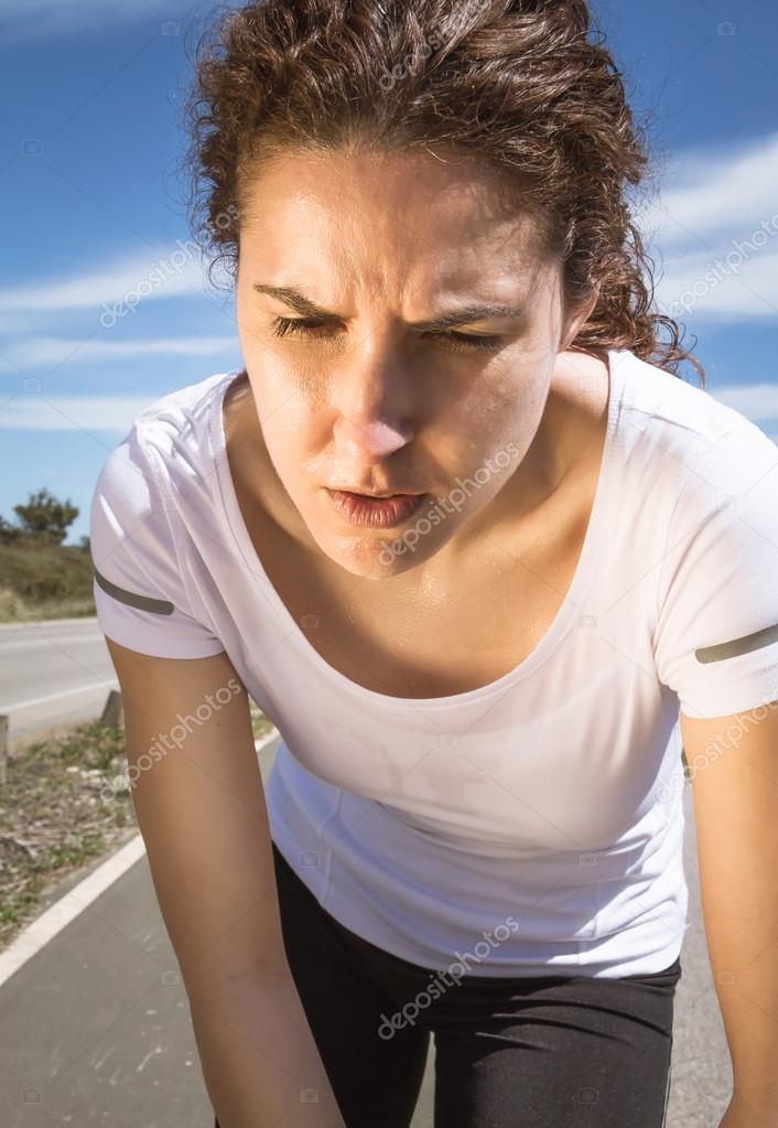 Tired runner girl sweating after running with sun Stock Photo by ©doble ...