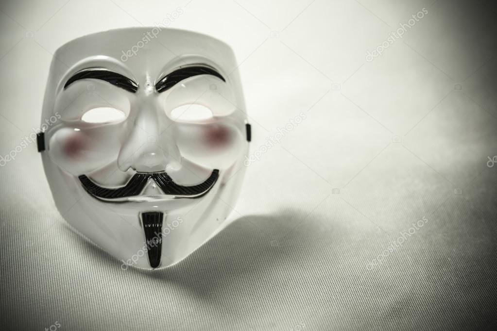 White anonymous mask on white background – Stock Editorial Photo ...